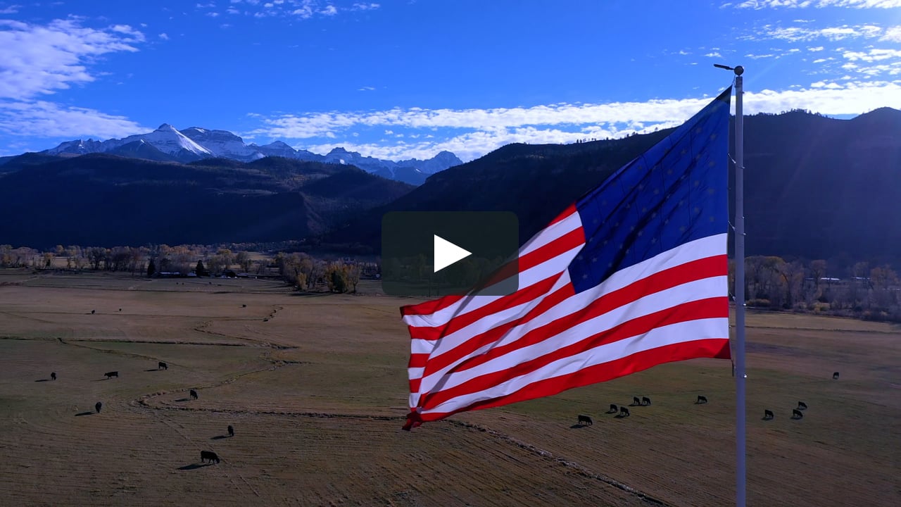 Large American Flag On Cattle Ranch in Mountains on Vimeo