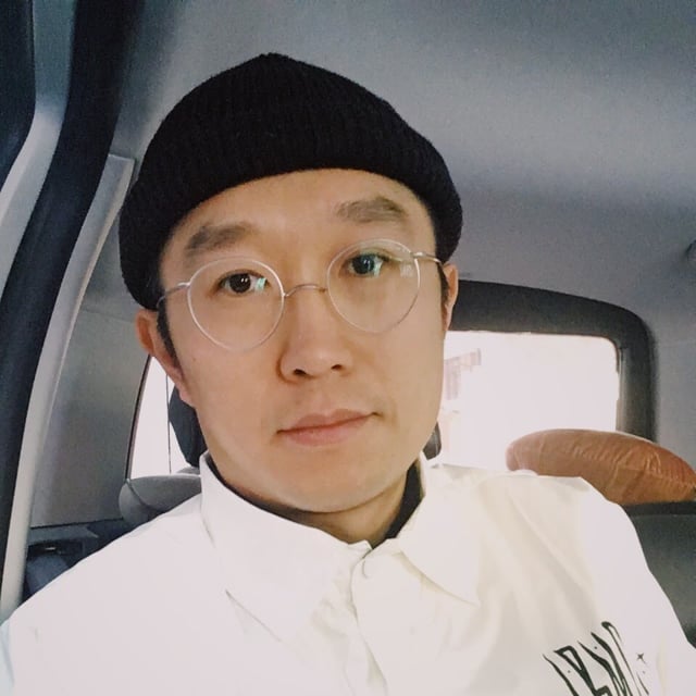 Andrew Guan - Director