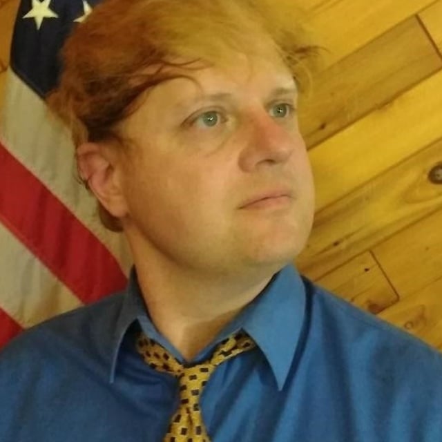 Governor Dr. Jason Vaughan