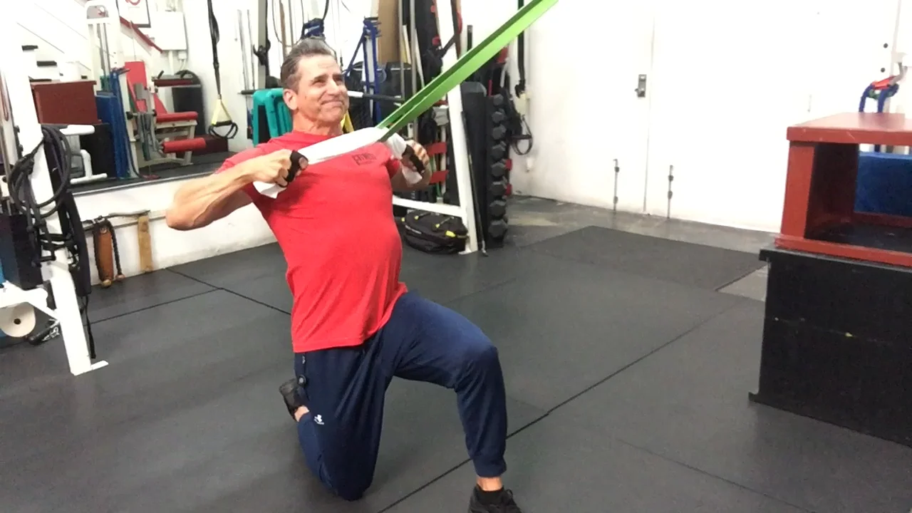 Kneeling high elbow row (towel) on Vimeo