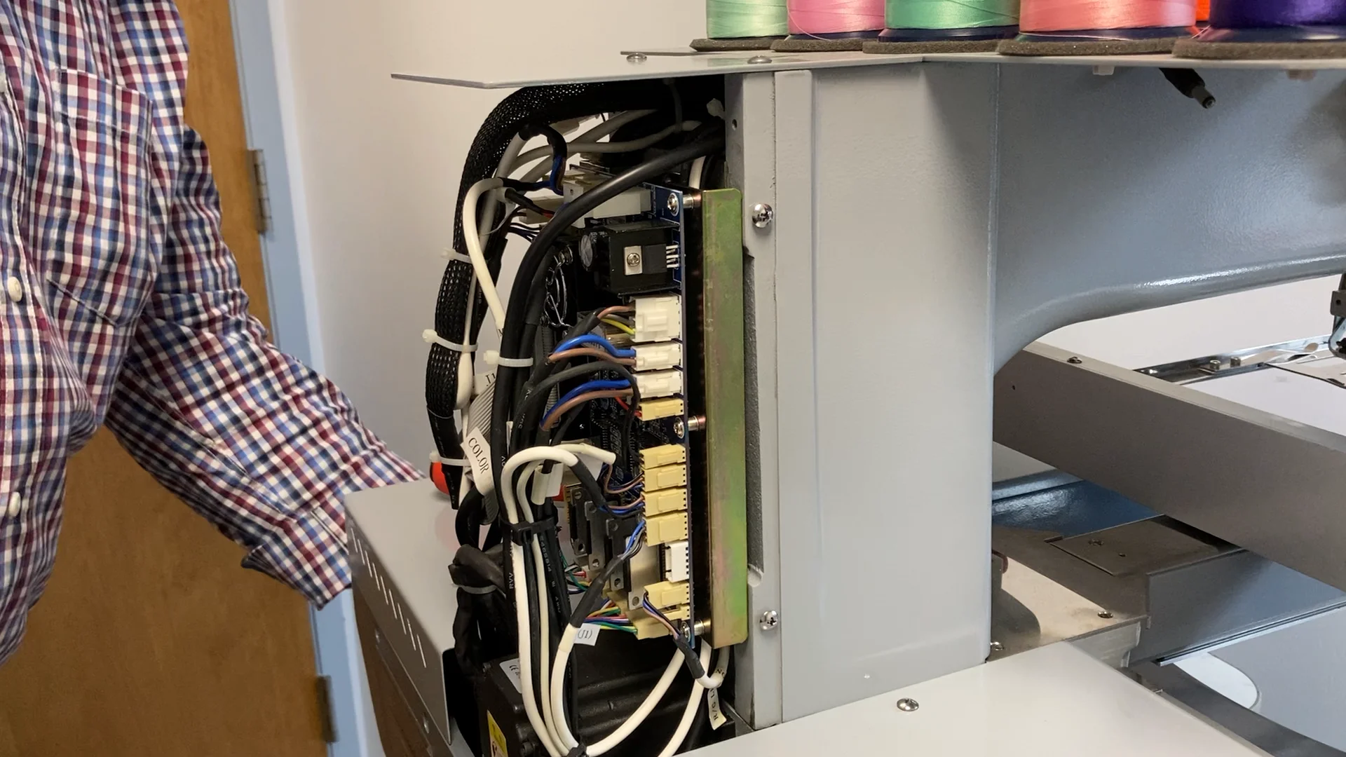 Reseating Thread break sensor on multi-function board