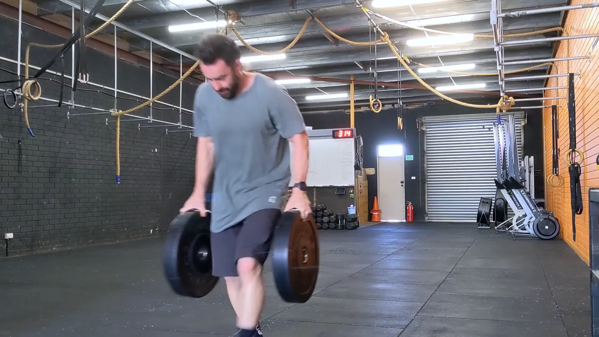 Bumper plate farmers carry with pinch grip on Vimeo