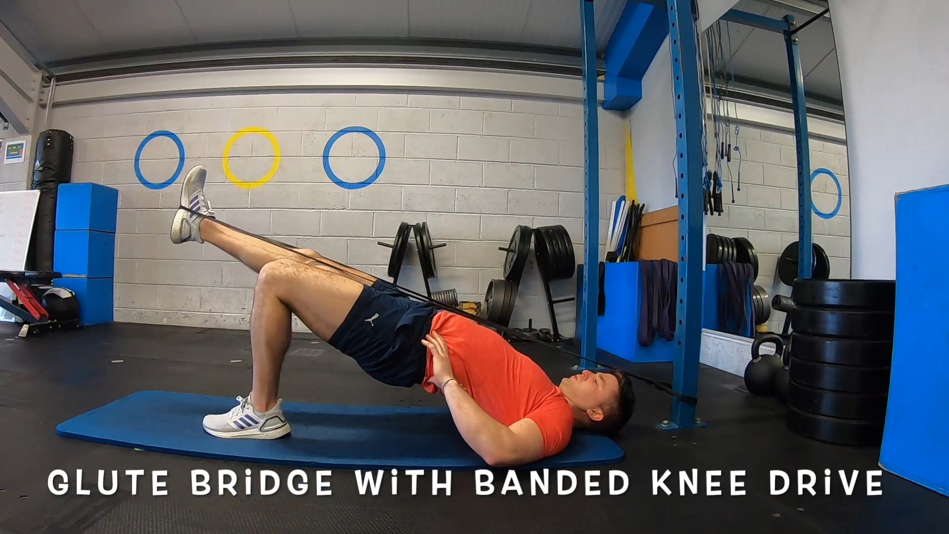 Glute bridge with banded knee drive.mp4 on Vimeo