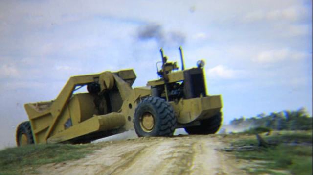 A4 Dozer pushing Scraper on Vimeo