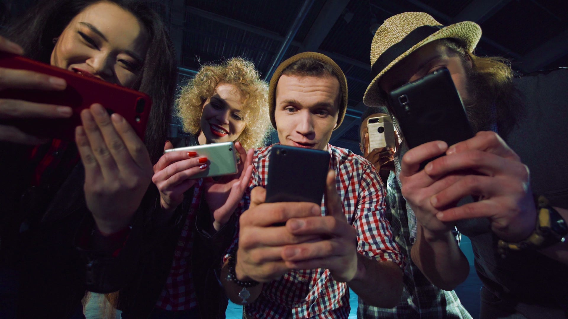 people-bending-to-camera-and-taking-shots-on-their-smartphones ...