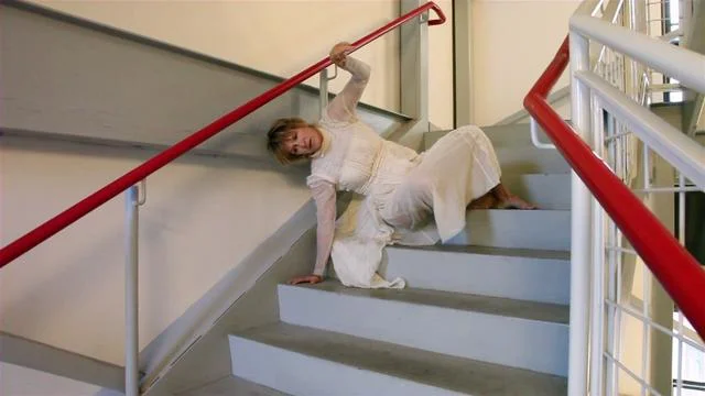 Woman Falling Down Stairs