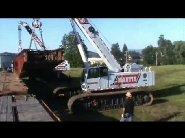 2 Crawler Cranes off loading a Railcar Turntable on Vimeo