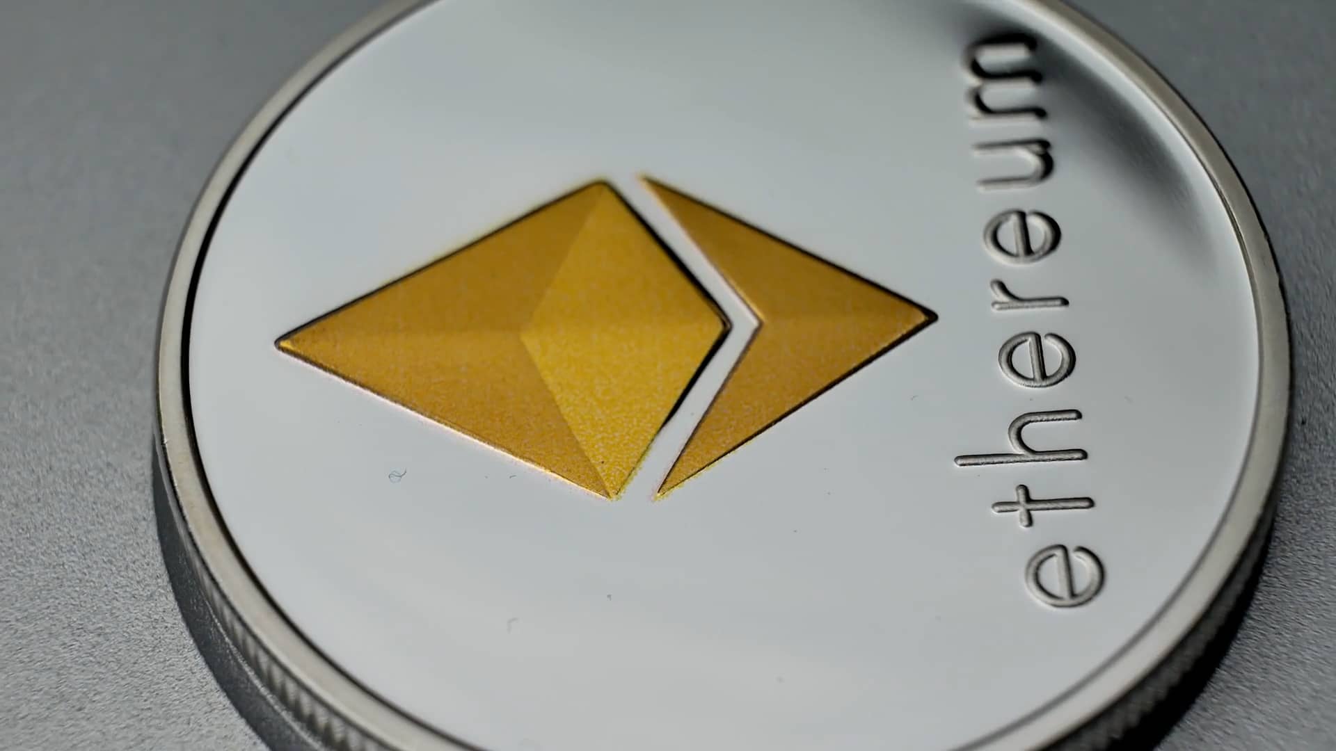 shining-silver-metal-ethereum-eth-coins-rotating-on-bills-of-euro ...