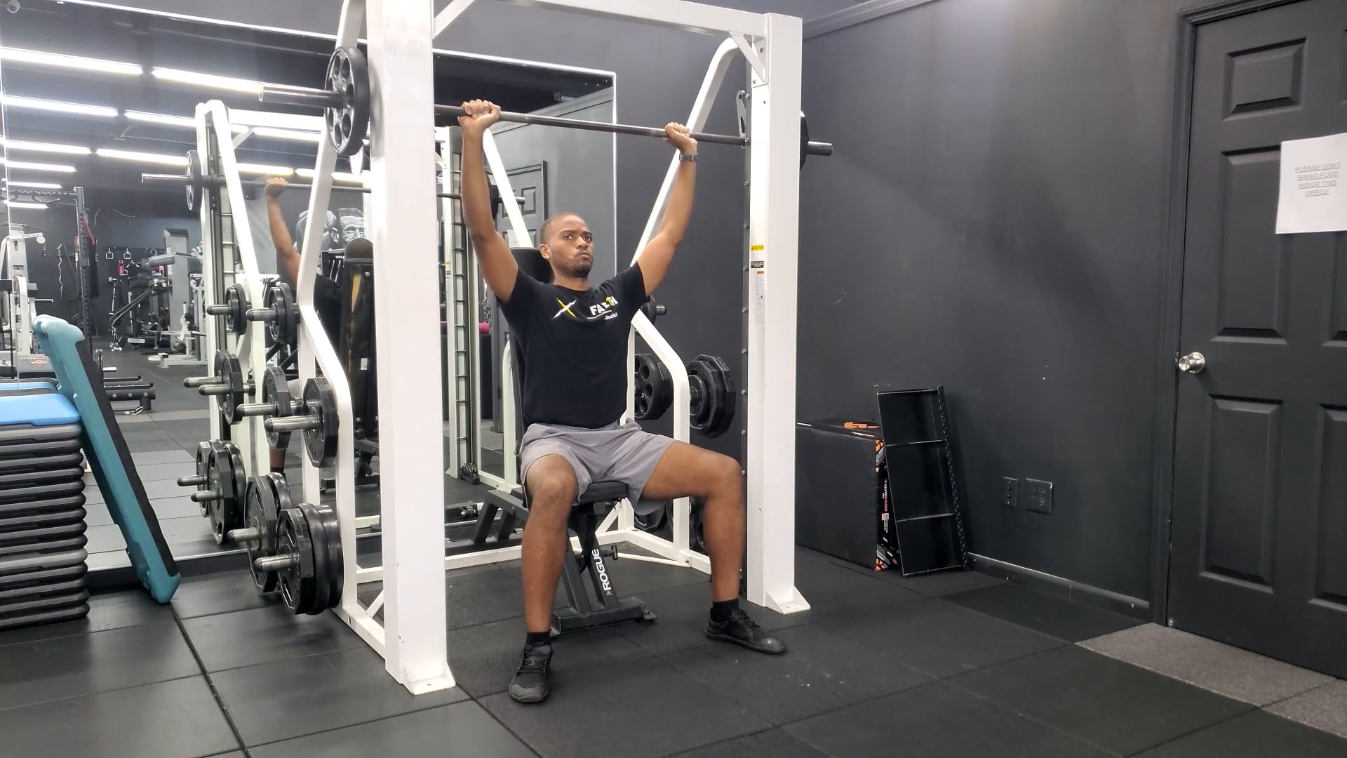 Smith Machine Seated Overhead Press on Vimeo