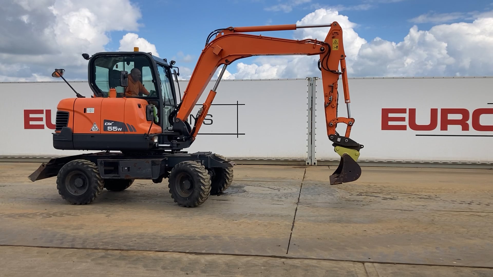 Doosan DX55WK Wheeled Excavator - Leeds June 22 on Vimeo