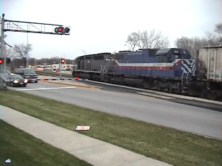 IMRL 381 with grey SD45 and SRY SD38-2. 2001.