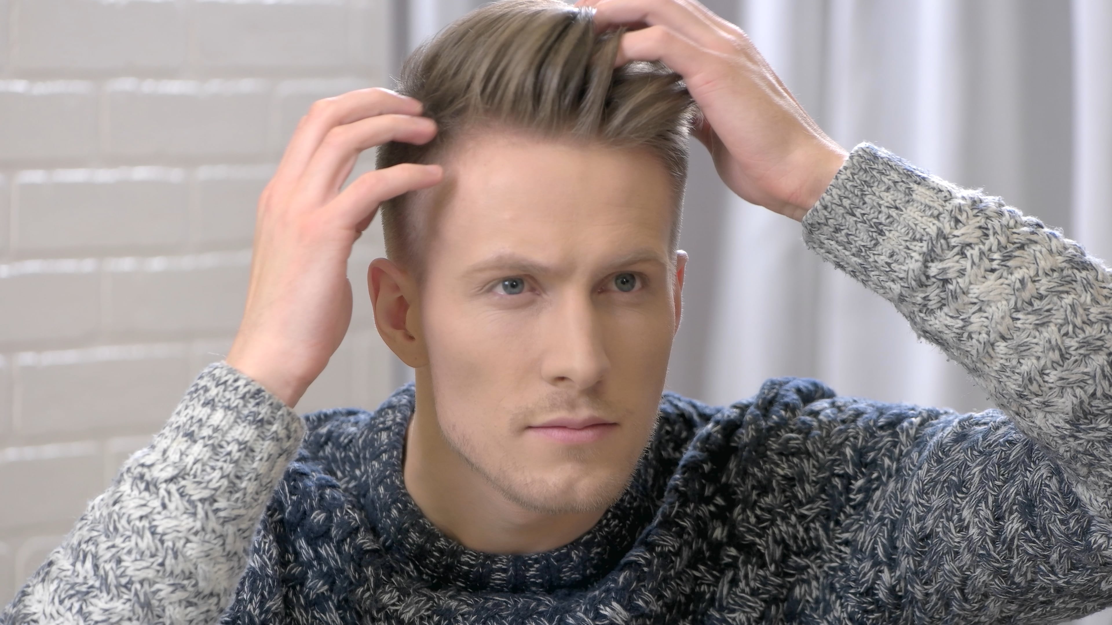 man-smiling-and-checking-hair-2022-08-04-19-18-23-utc on Vimeo