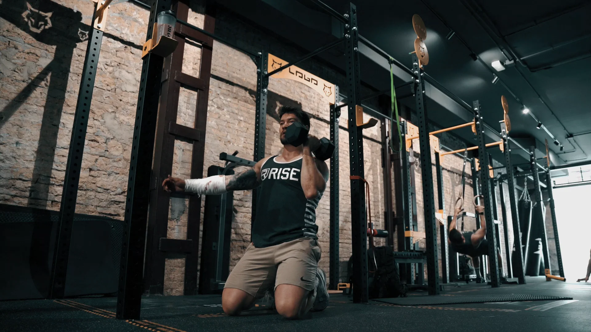 db tall kneeling push press on Vimeo