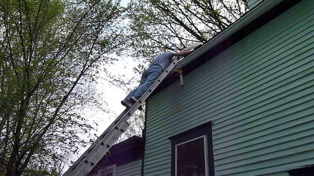 Marcia fixing the roof on Vimeo