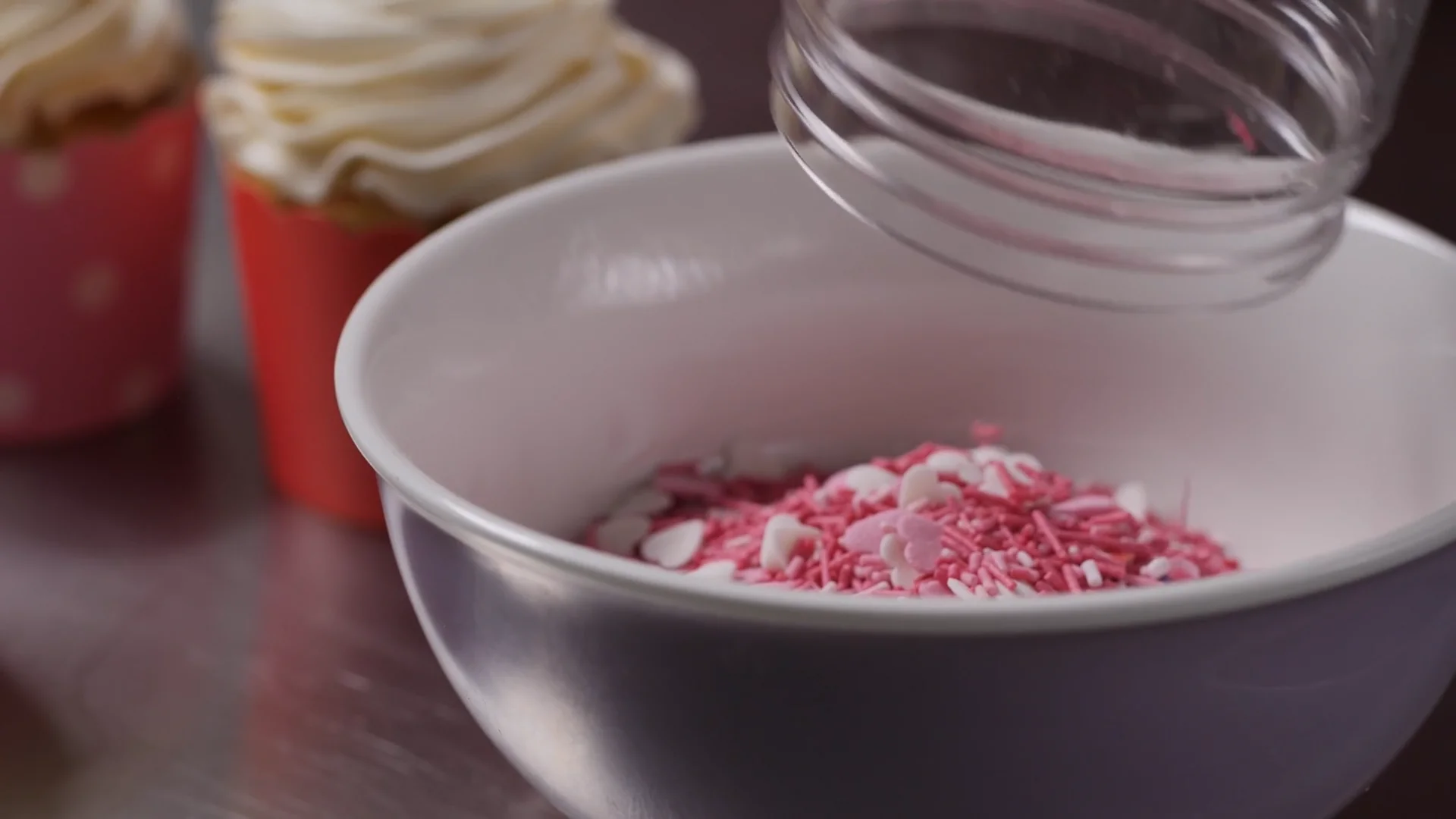 Pouring sprinkles in a bowl on Vimeo