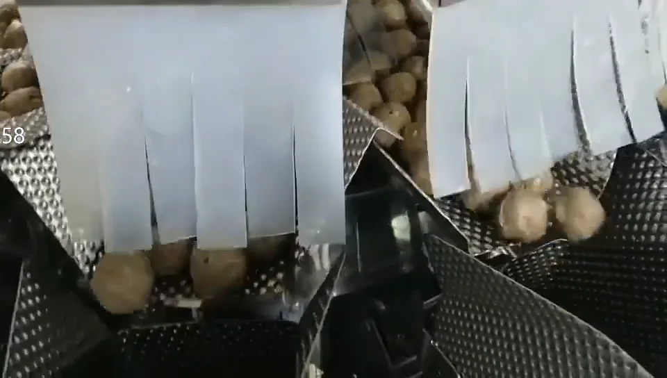 Meatball vacuum packaging machine Rotary premade pouch vacuum packaging ...