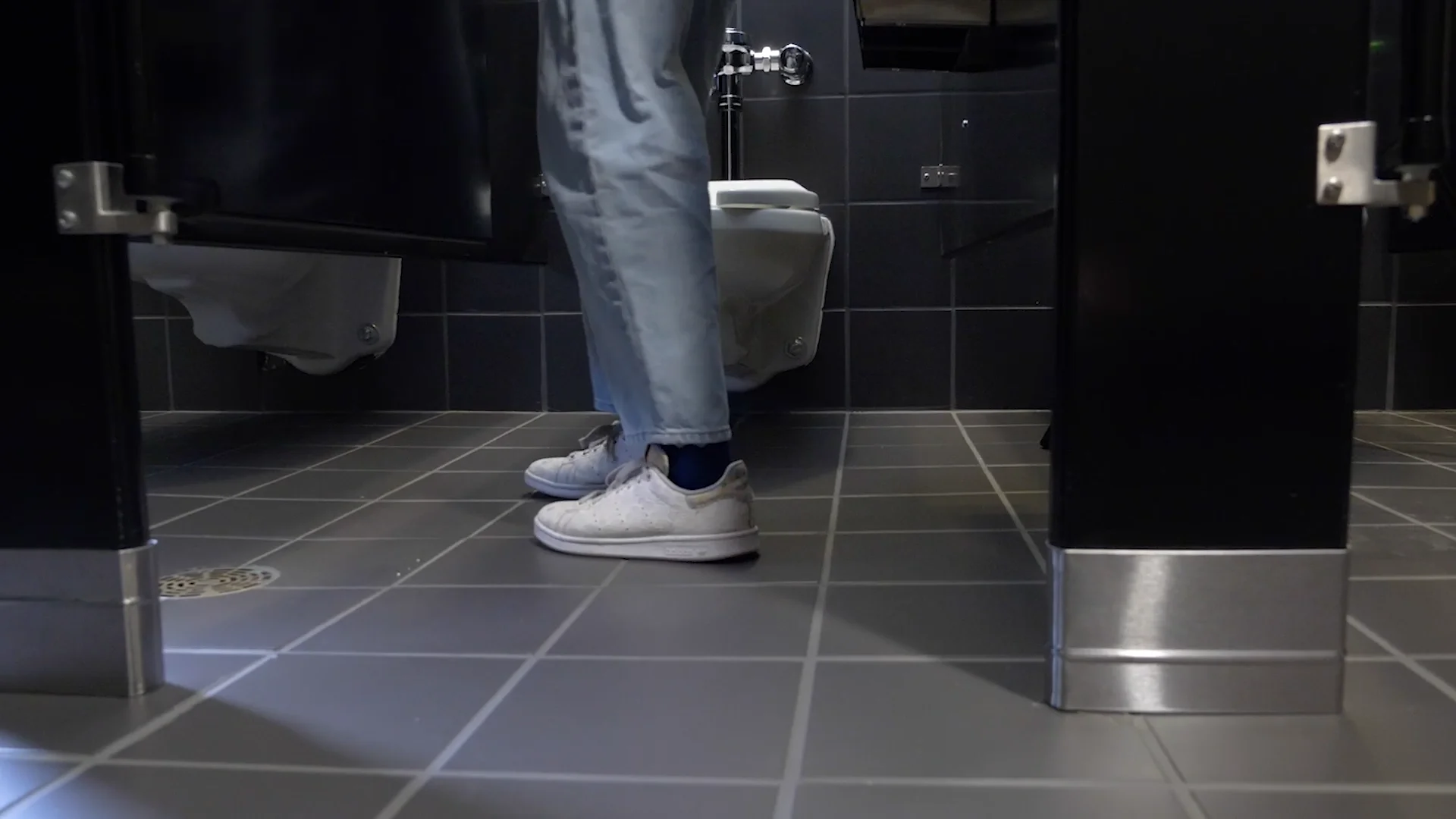 Under the Bathroom Stall