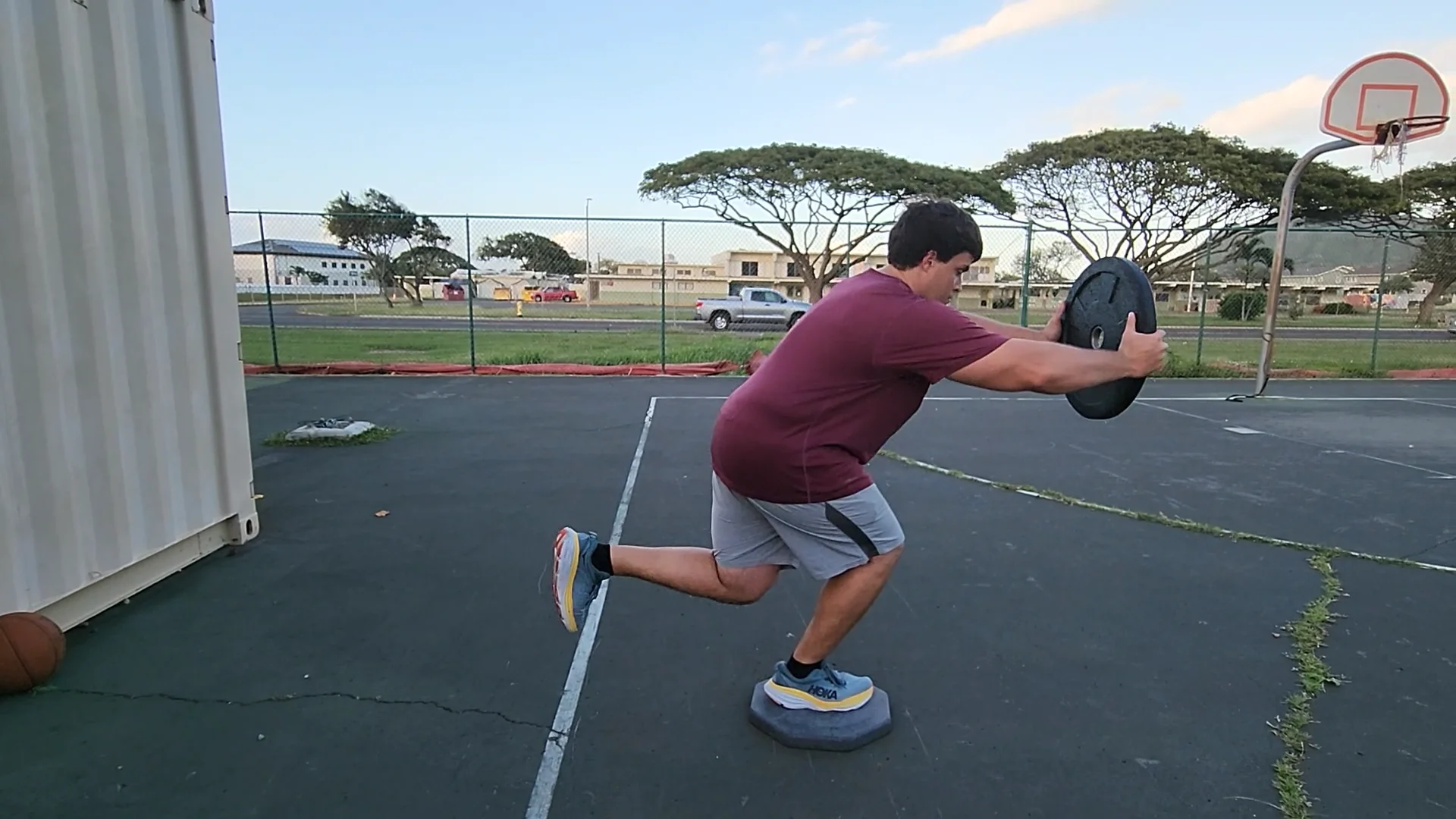 Elevated plate skater squat