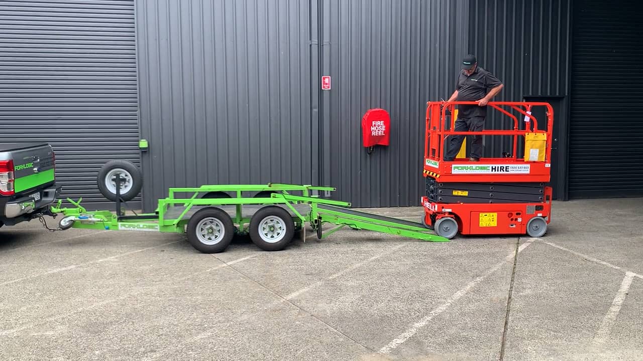 Forklogic - Heli Scissor Lift driving onto trailer on Vimeo