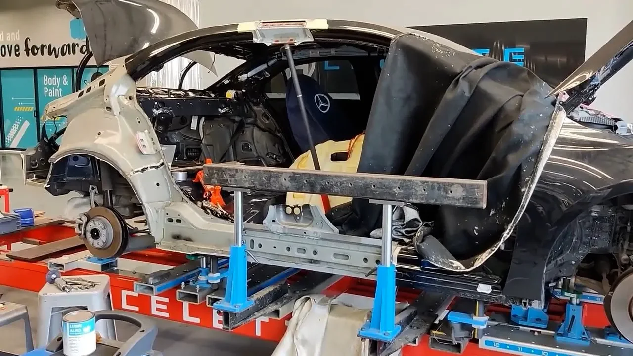 B-pillar replacement - Mercedes-Benz structural repair on Celette bench ...