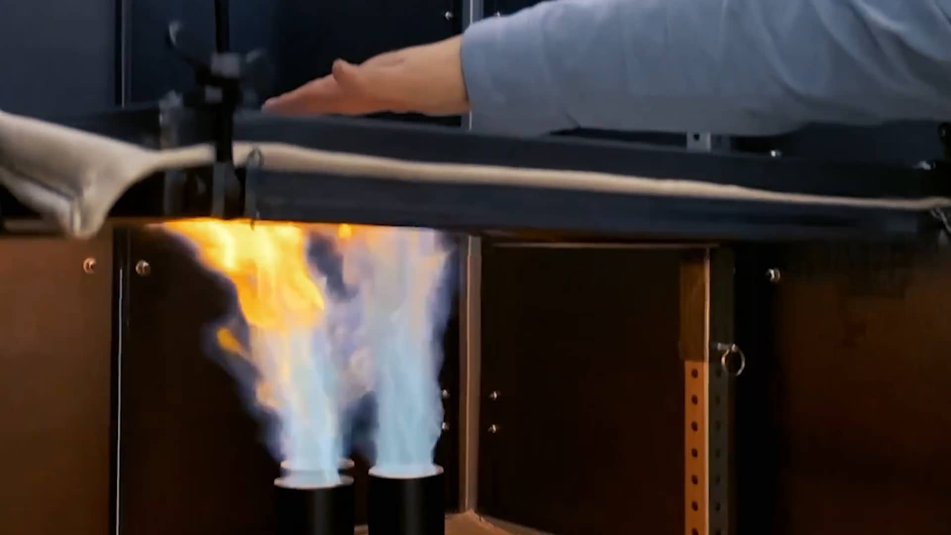 Lithium-Ion Battery Fire Containment Blanket Torch Test on Vimeo