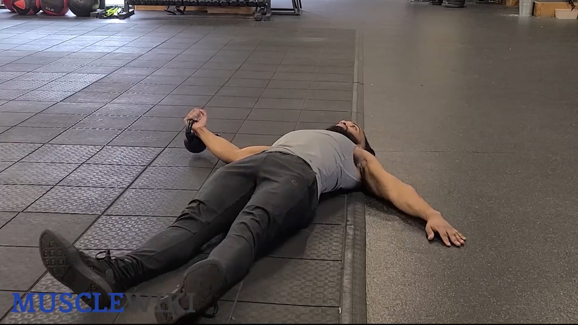 male-kettlebell-single-arm-chest-fly-front on Vimeo