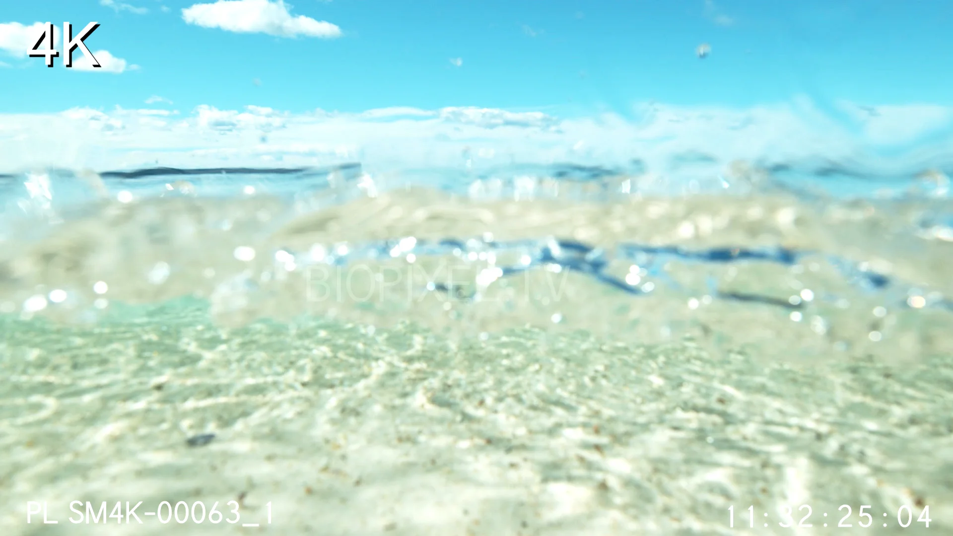Temperate Waters 4K - Water breaking over lens on beach slow motion 500 ...