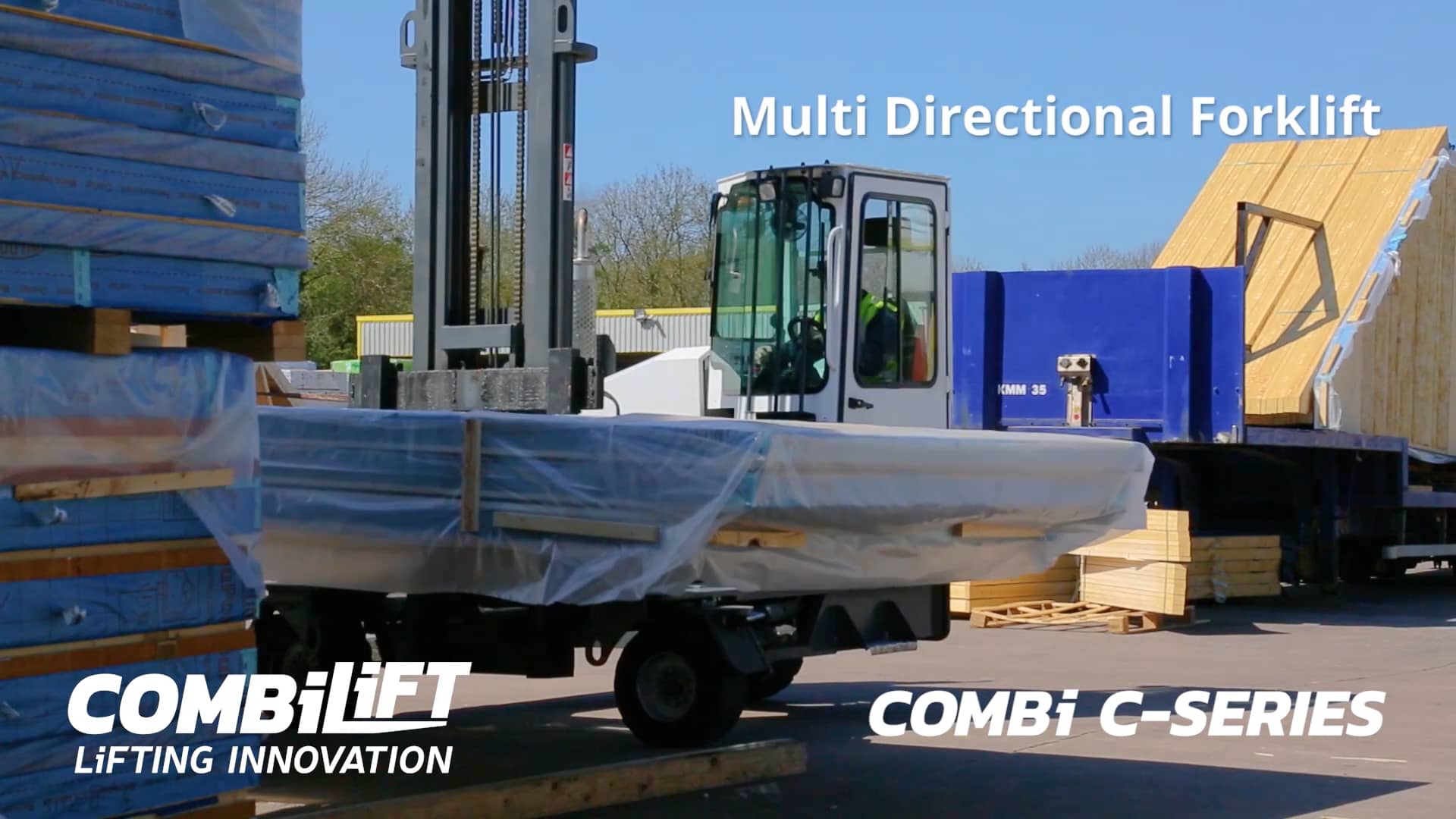 Combilift_C-series_multi-directional_forklift_lifting_wood_products ...