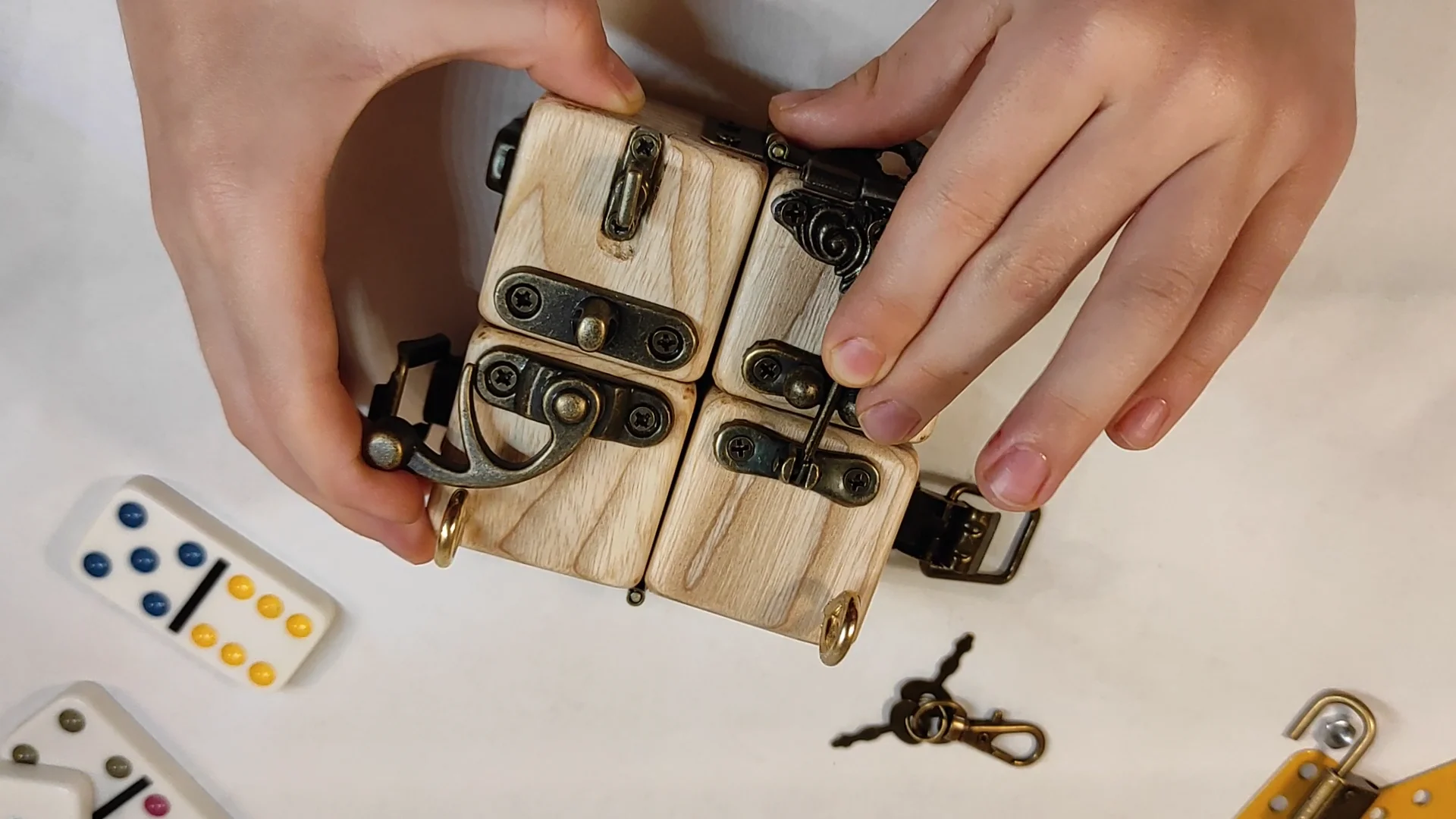 Montessori fidget cube with locks and latches on Vimeo