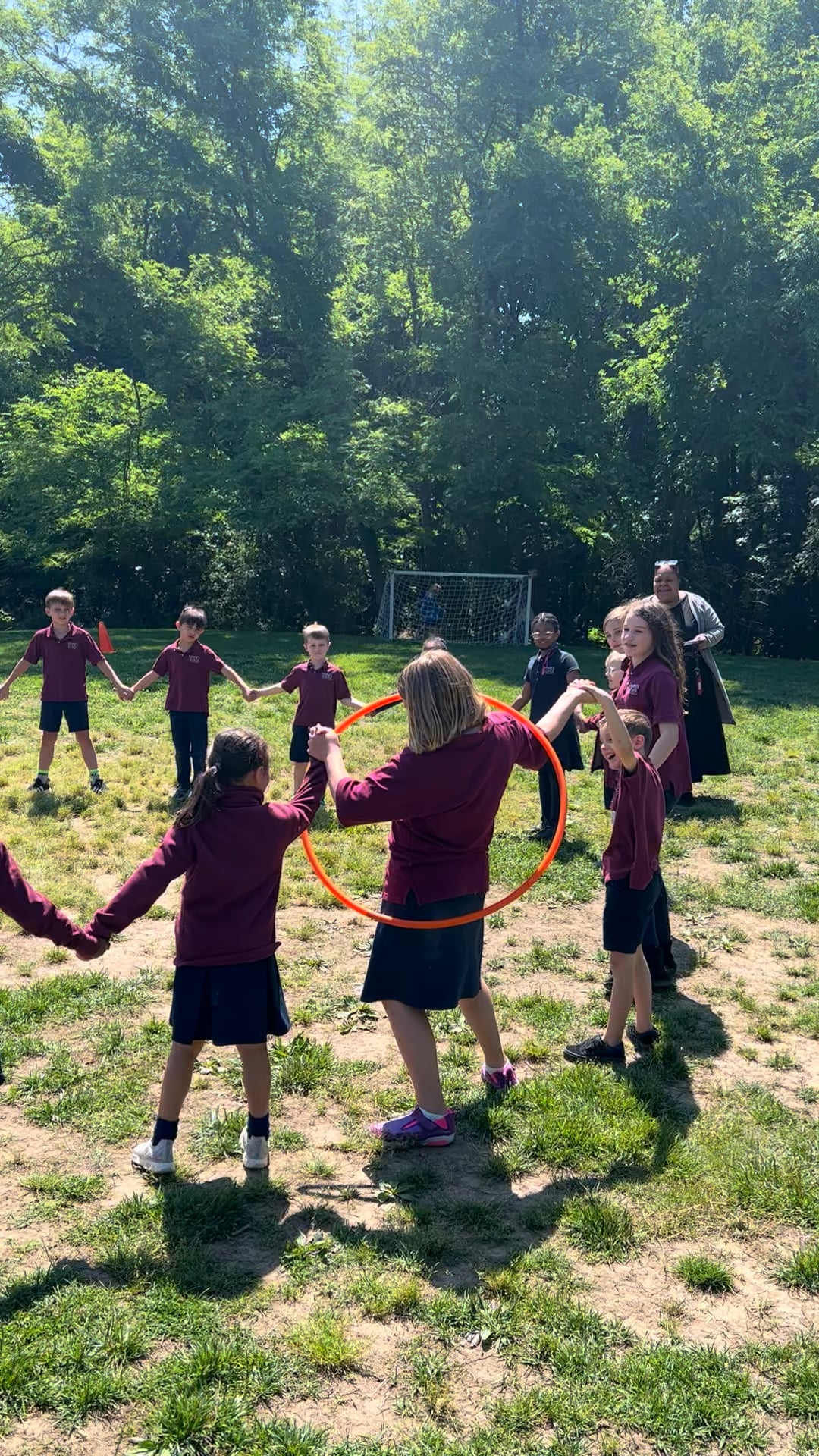 Kindergarten and Fourth Grade Collaborate for Hoola Hoop Pass Through ...