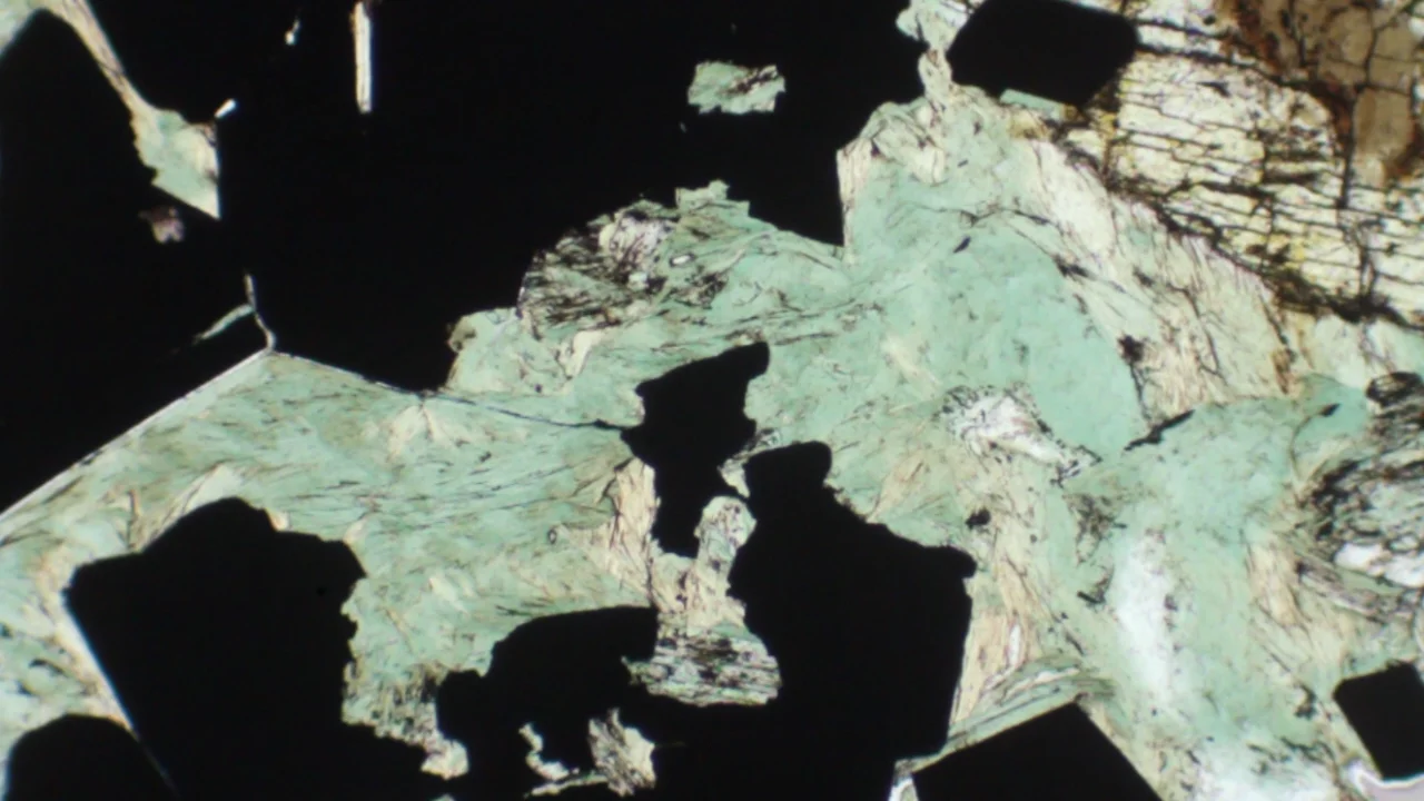 chamosite-clinochlore ss in thin section FKM-406 PPL on Vimeo