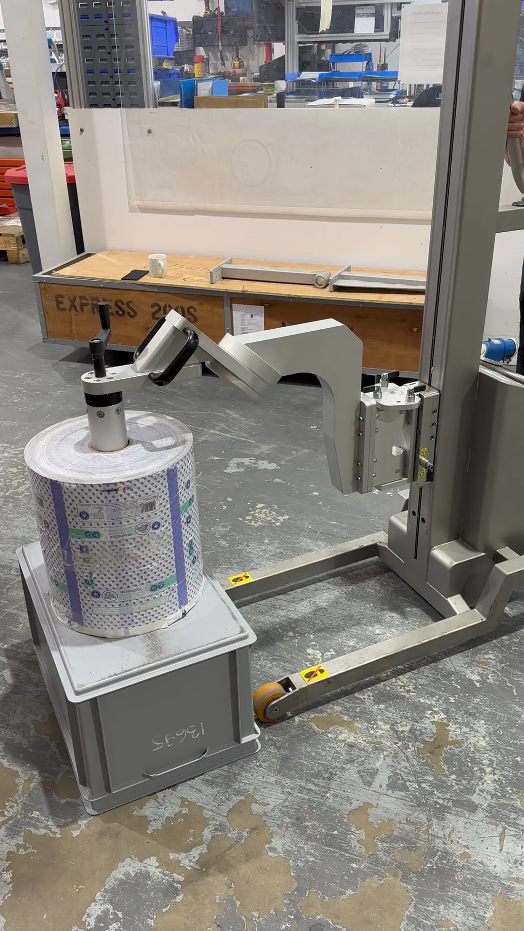 Roll Handling with Hinged Vertical Spindle Attachment and Manual ...