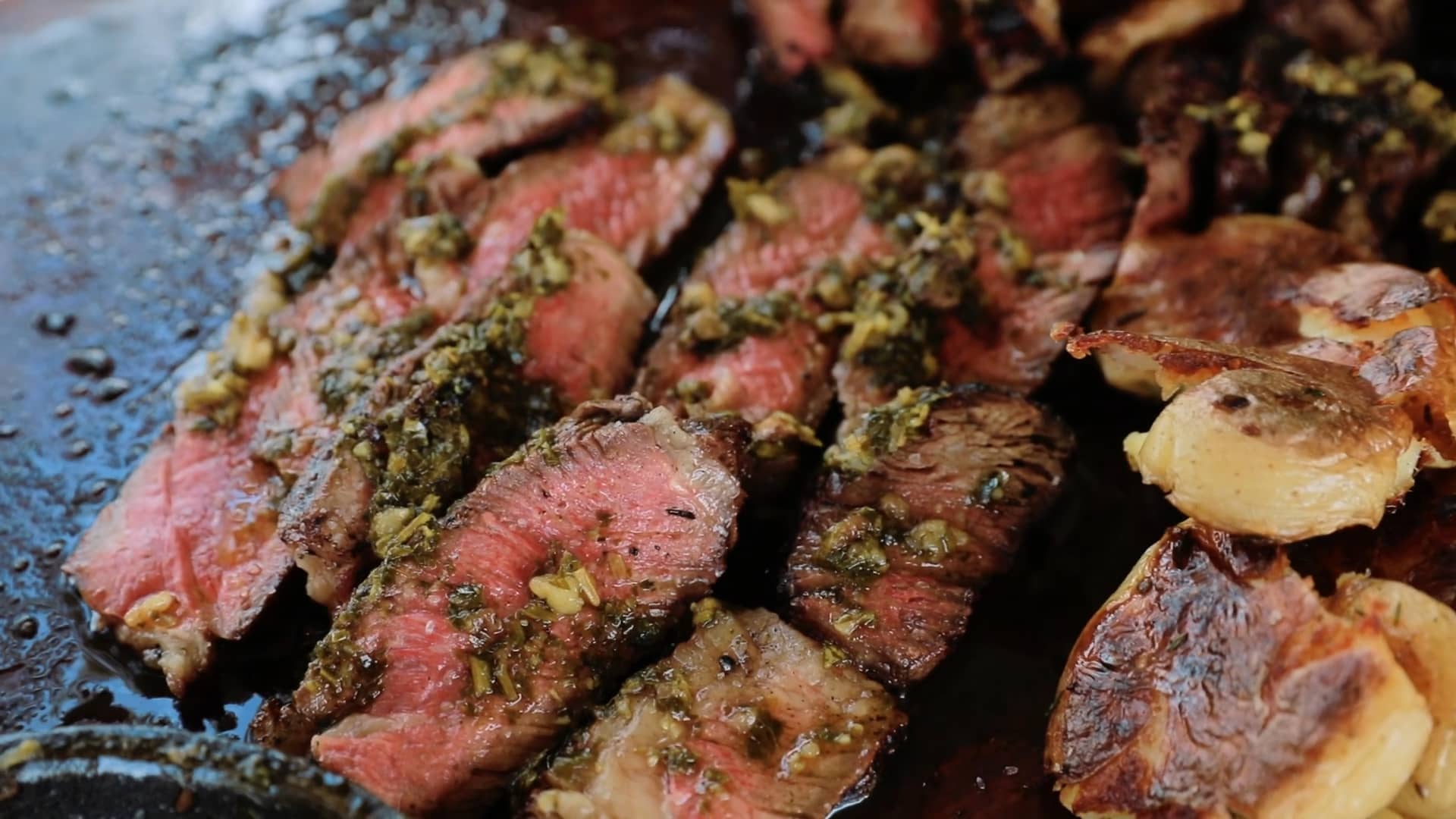 Beef Tomahawk steak cooked over fire with bone marrow chimmichuri and ...