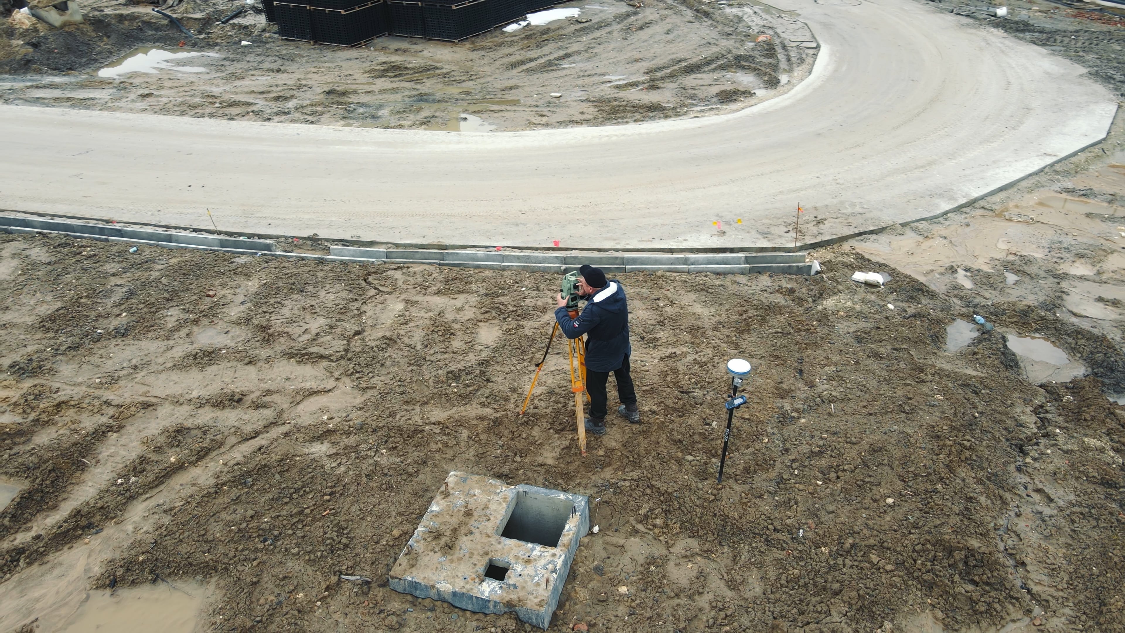 aerial-view-surveyors-measuring-the-ground-level-t-2022-08-04-23-27-39 ...