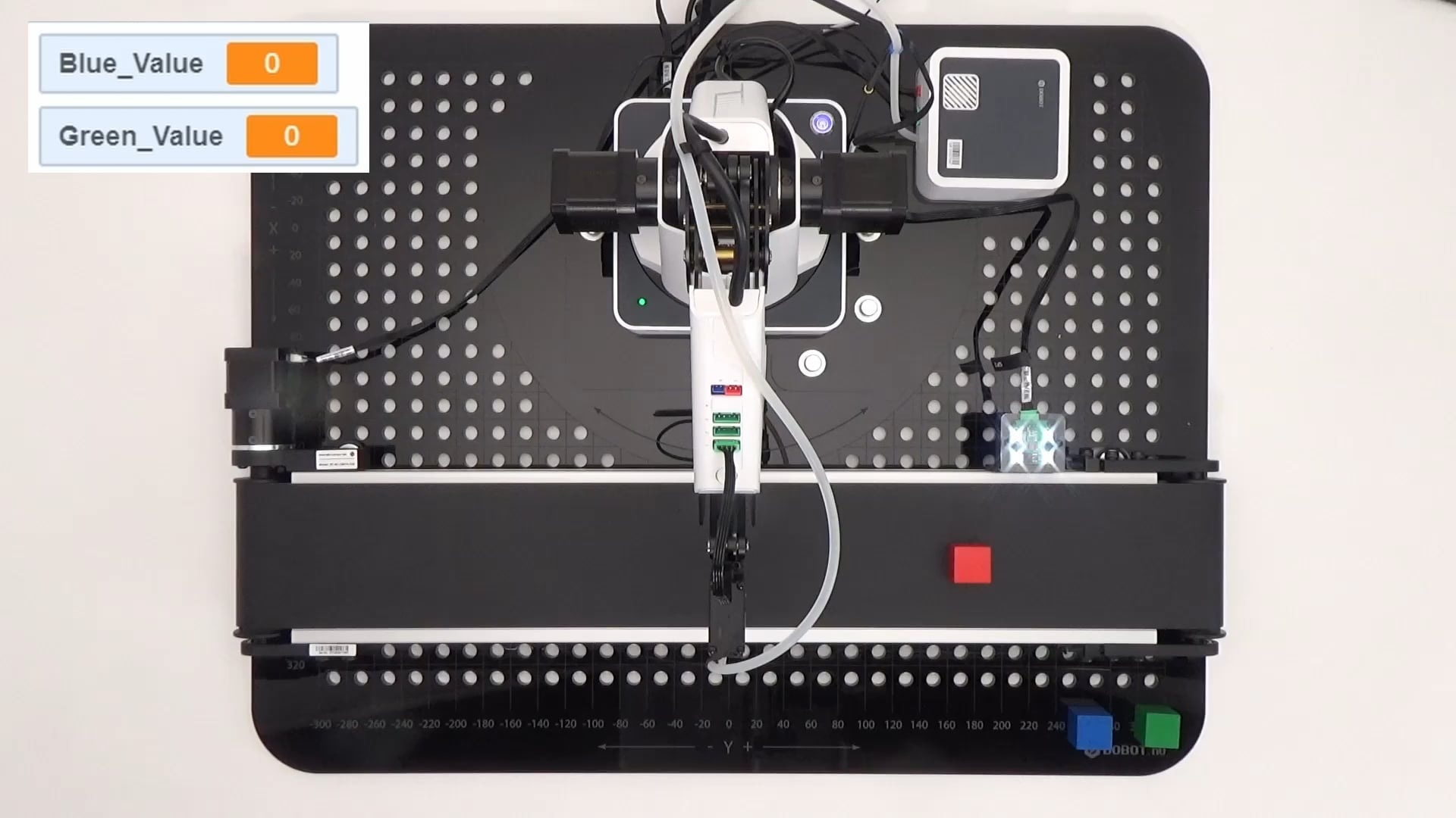 Dobot Magician & Conveyor belt - 10 Assignment: Blue colour starts & green stops the conveyor ...