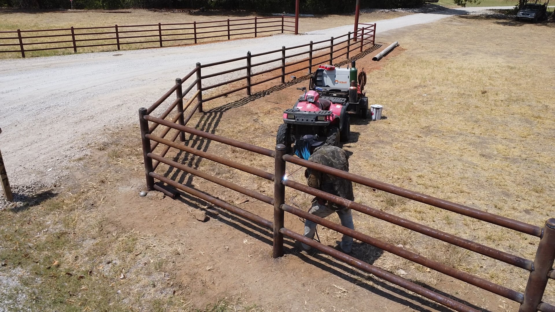Top Rail Pipe Fence | Fine Cut Construction LLC