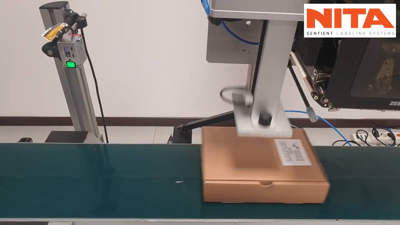 New Nita Print and Apply with all-electric Linear Tamp Blow Arm on Vimeo