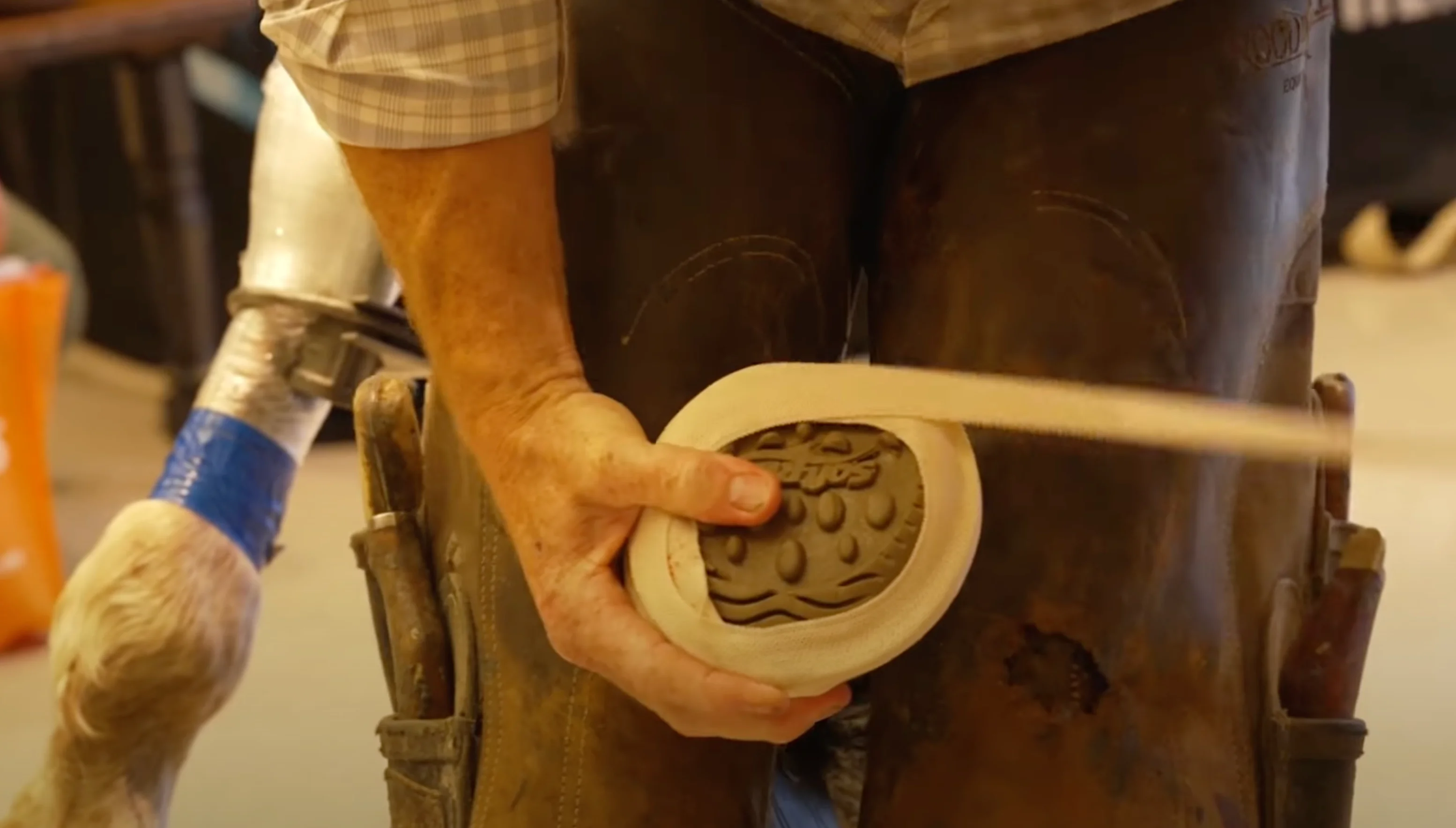 Stuart Muir using elastikon tape for temporary SoftRider attachment on ...