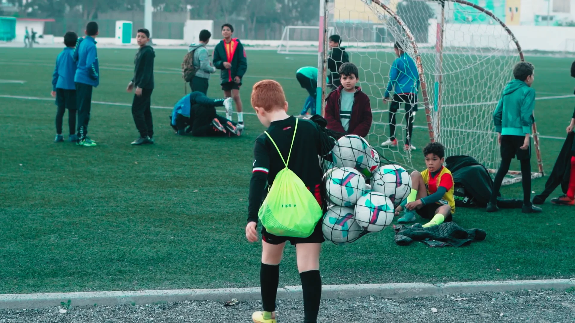 Junion soccer players , Kids playing football