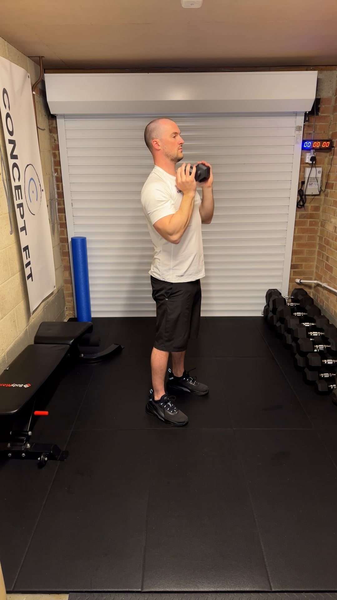 Two Handed Single Dumbbell Shoulder Press