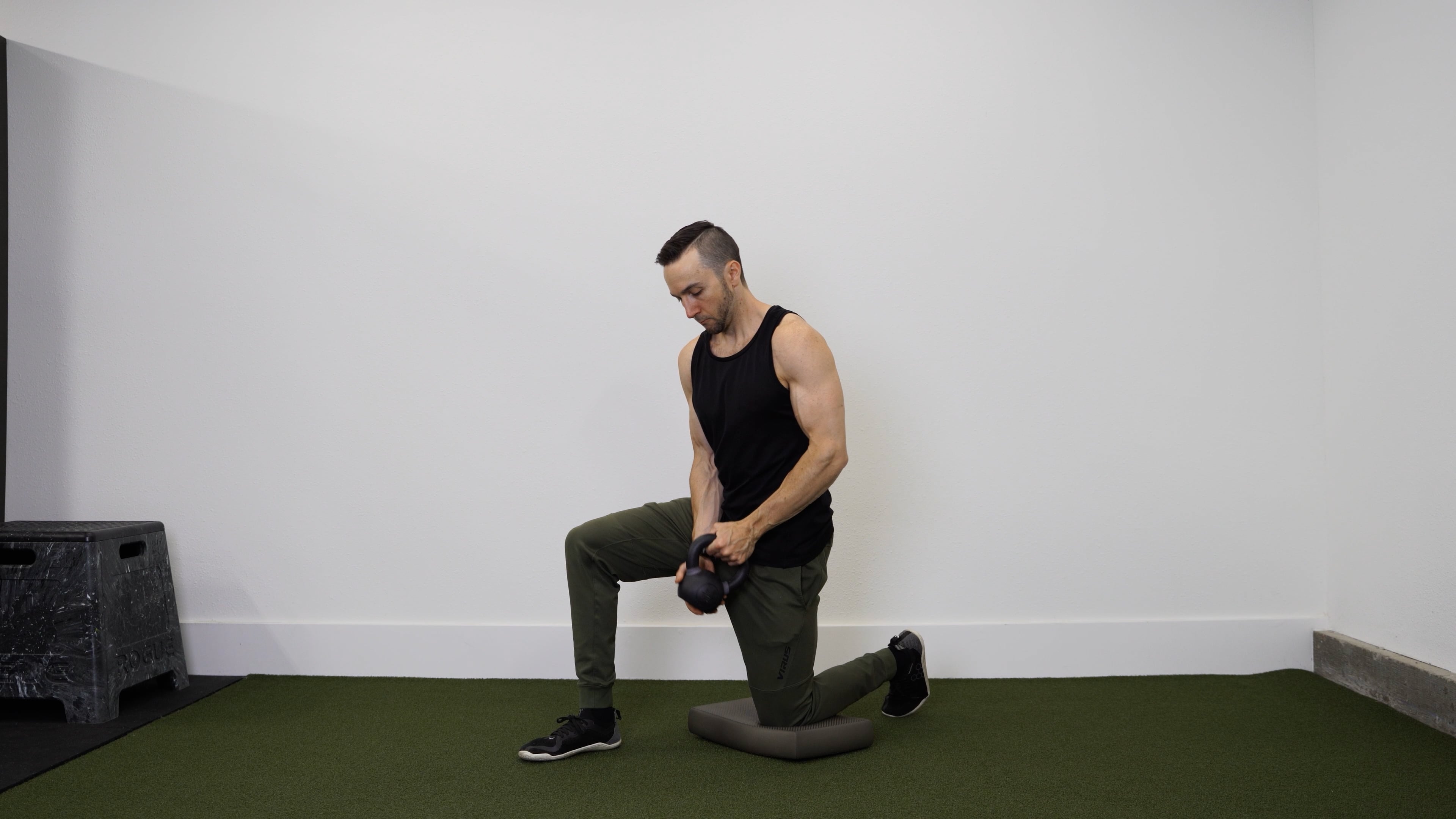 Half Kneeling Bottoms Up Kettlebell Press (Demo)