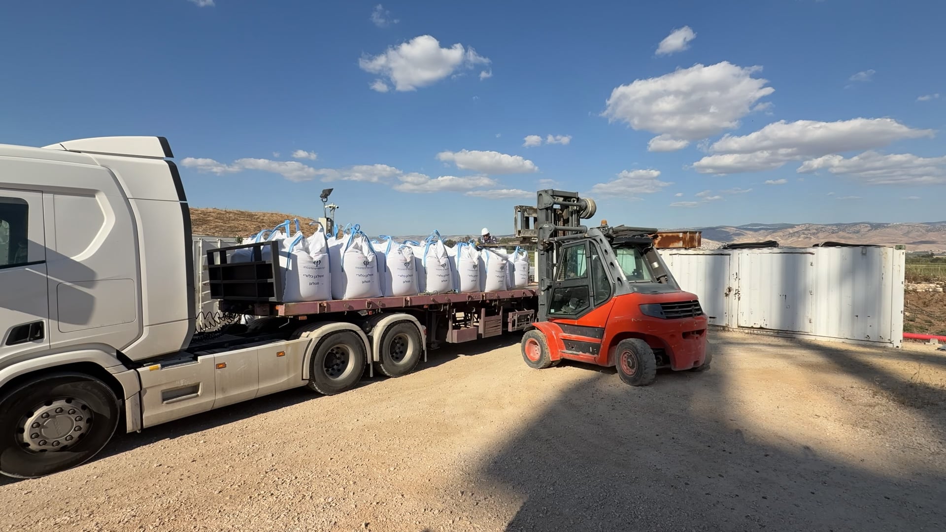 Zion Oil & Gas Rig Site - Unloading Drilling Mud Bulk Sacks