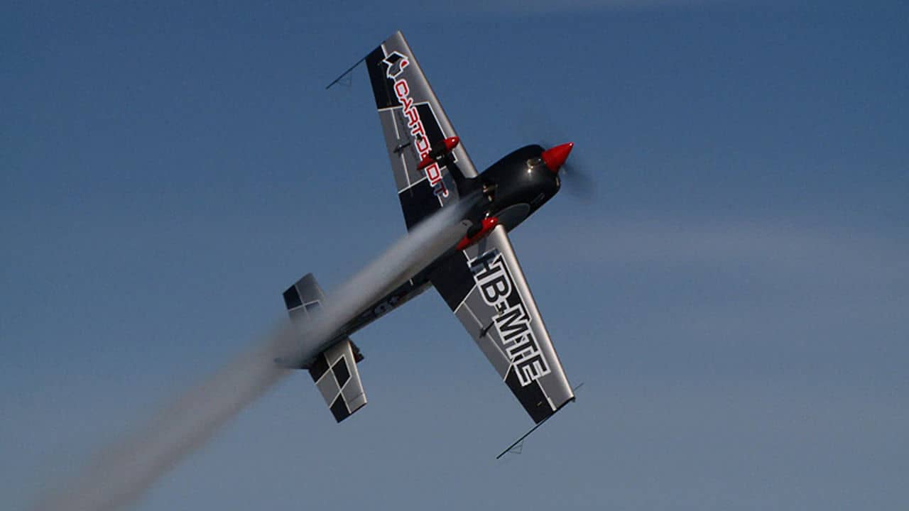 Extra 330 SC Aerobatics in the swiss Alps, Switzerland 2012 on Vimeo