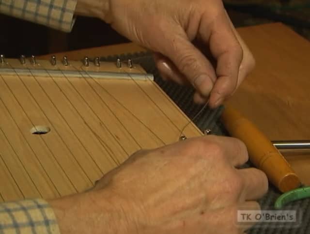 How to replace a lap harp string on Vimeo