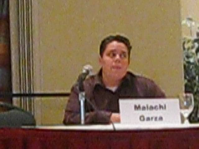 Malachi Garza speaking at the Oakland Police Department Conference on ...