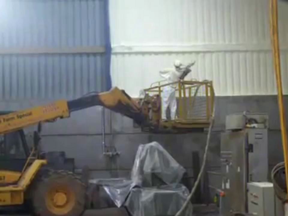 Industrial building being sprayed with IsoSpray spray foam loft & roof ...