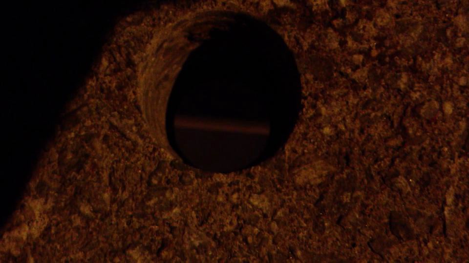 Looking through a hole in an overpass near Sherbrooke and Highway 15 ...