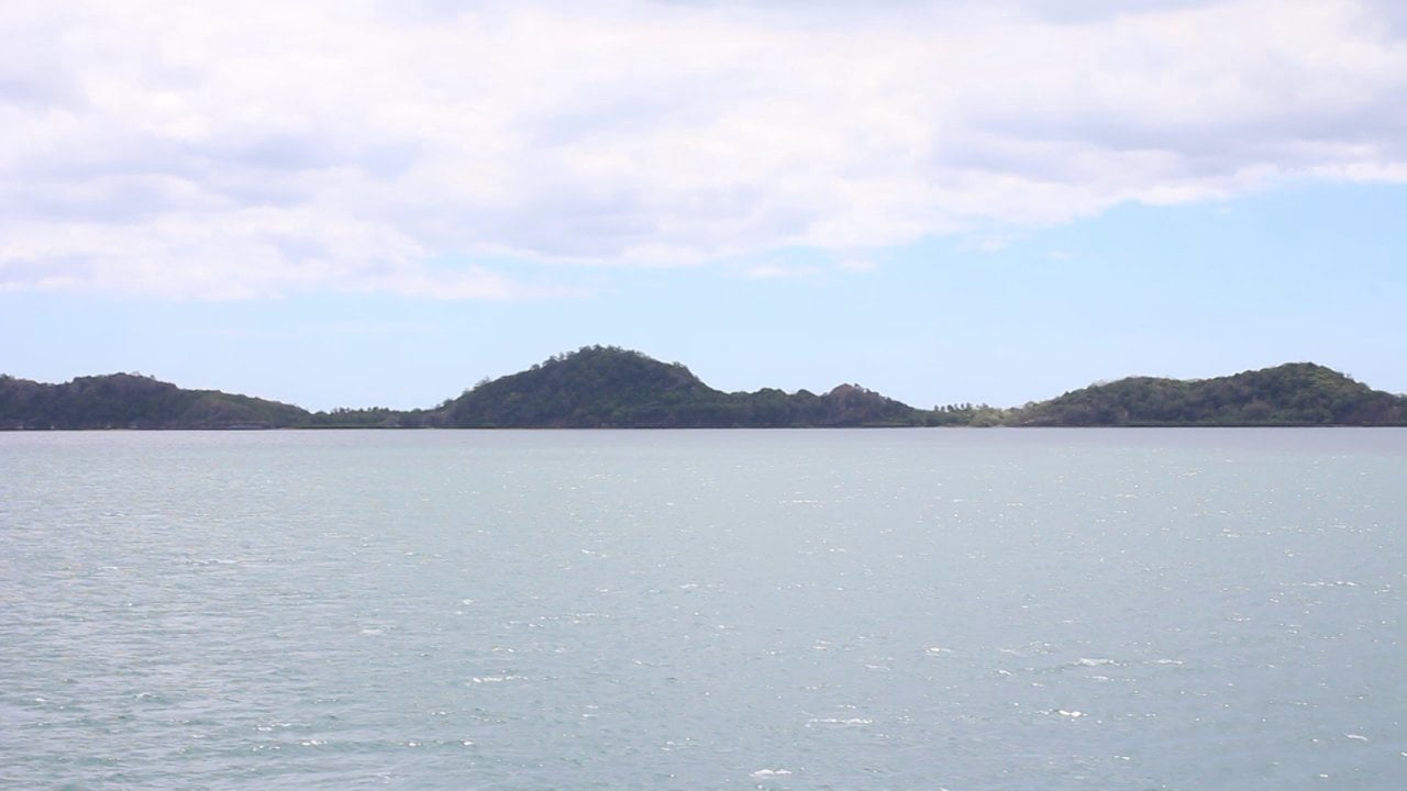 MV Westerland Ferry Passing VOROVORO Island from Malau, Fiji on Vimeo