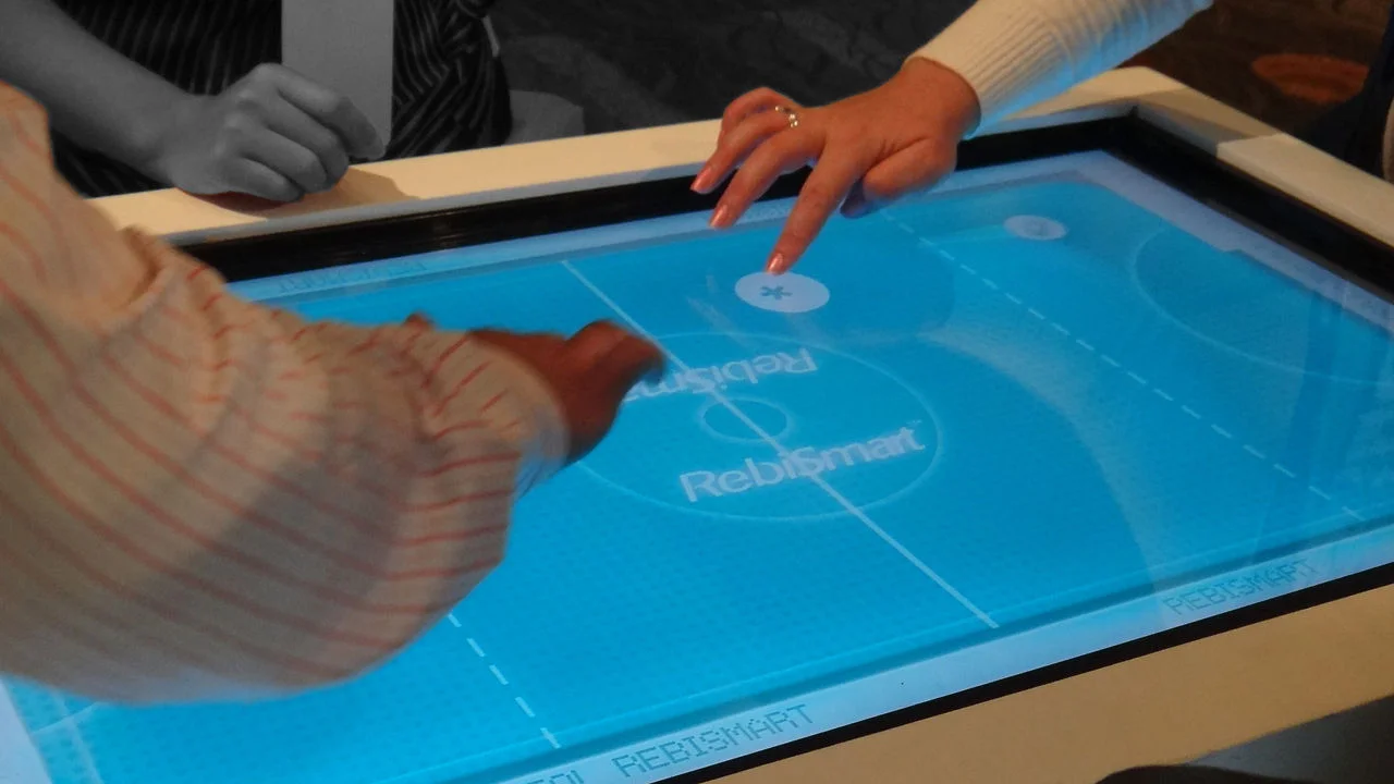 Merck digital air hockey + trivia game @ RebiSmart booth in neurology ...