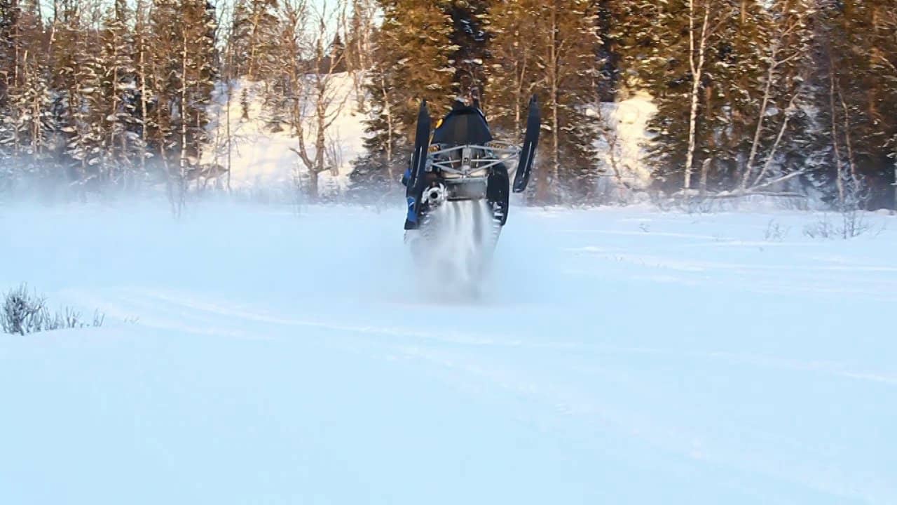 Ted's Snowmobile wheelie on Vimeo